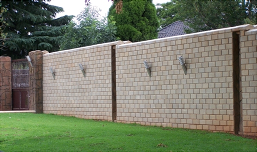 Figure 15. A boundary wall constructed with interlocking blocks ...